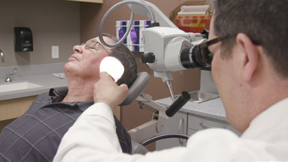 Pioneering ear surgery removes tumors, improves hearing